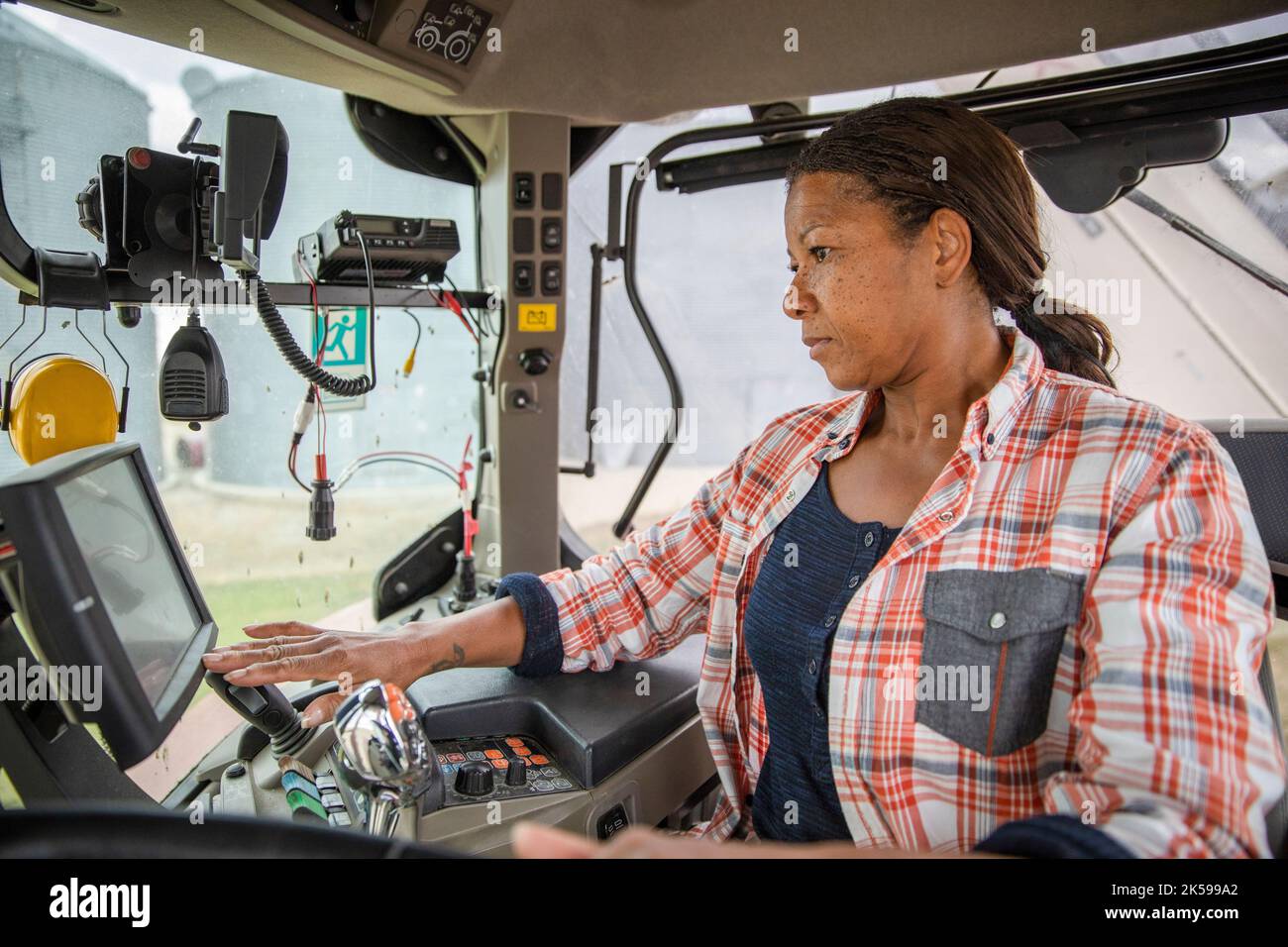 Operating tractor hi-res stock photography and images - Alamy