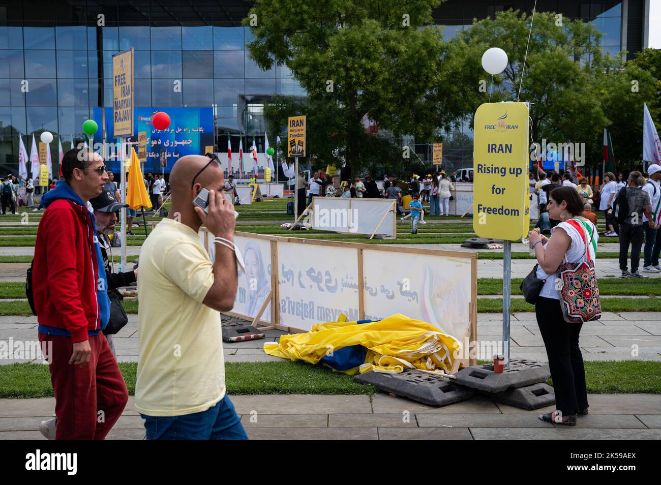 23.07.2022, Germany, Berlin - People walk past preparations for the ...