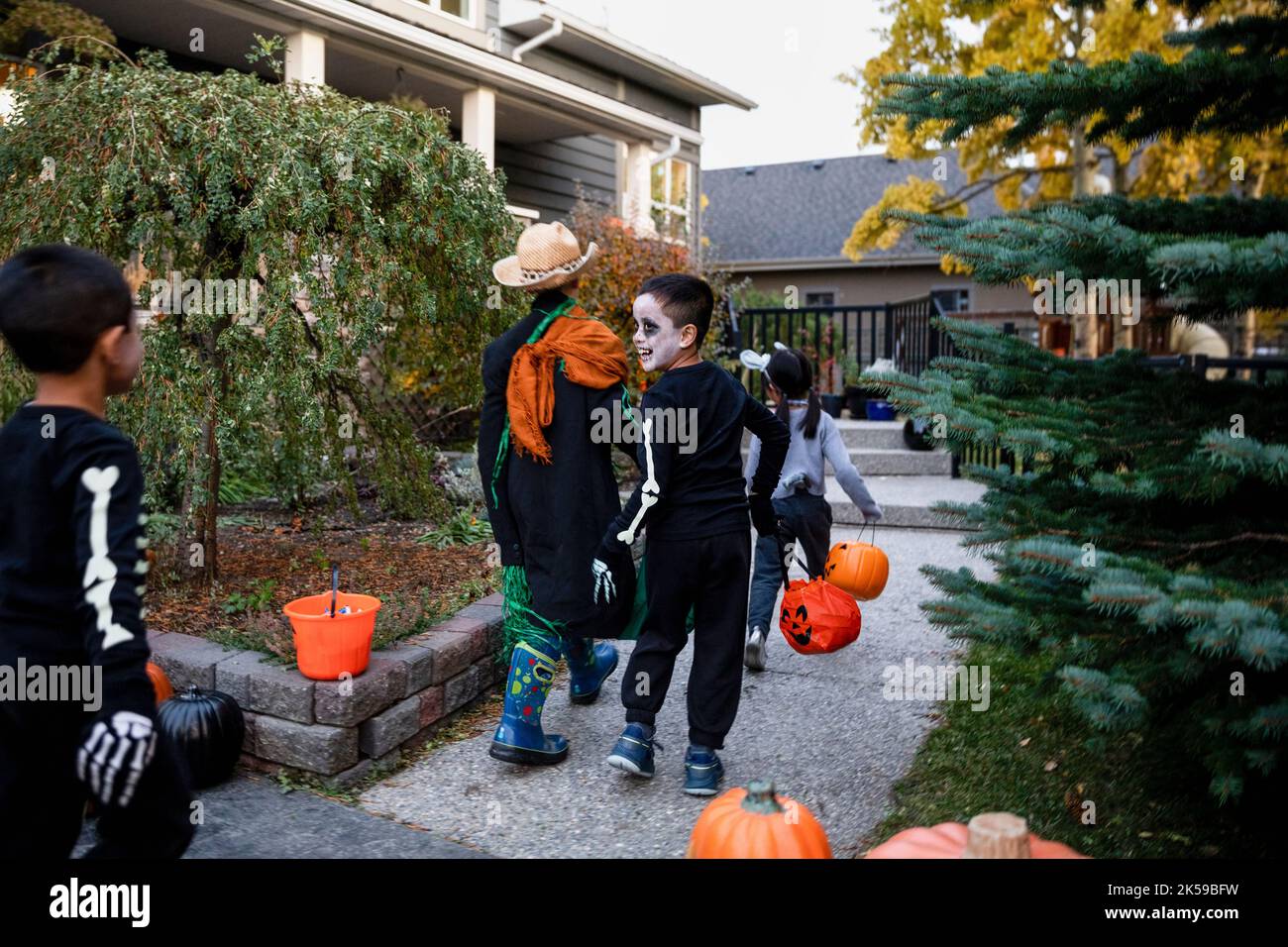 Children trick or treating costume hi-res stock photography and images ...