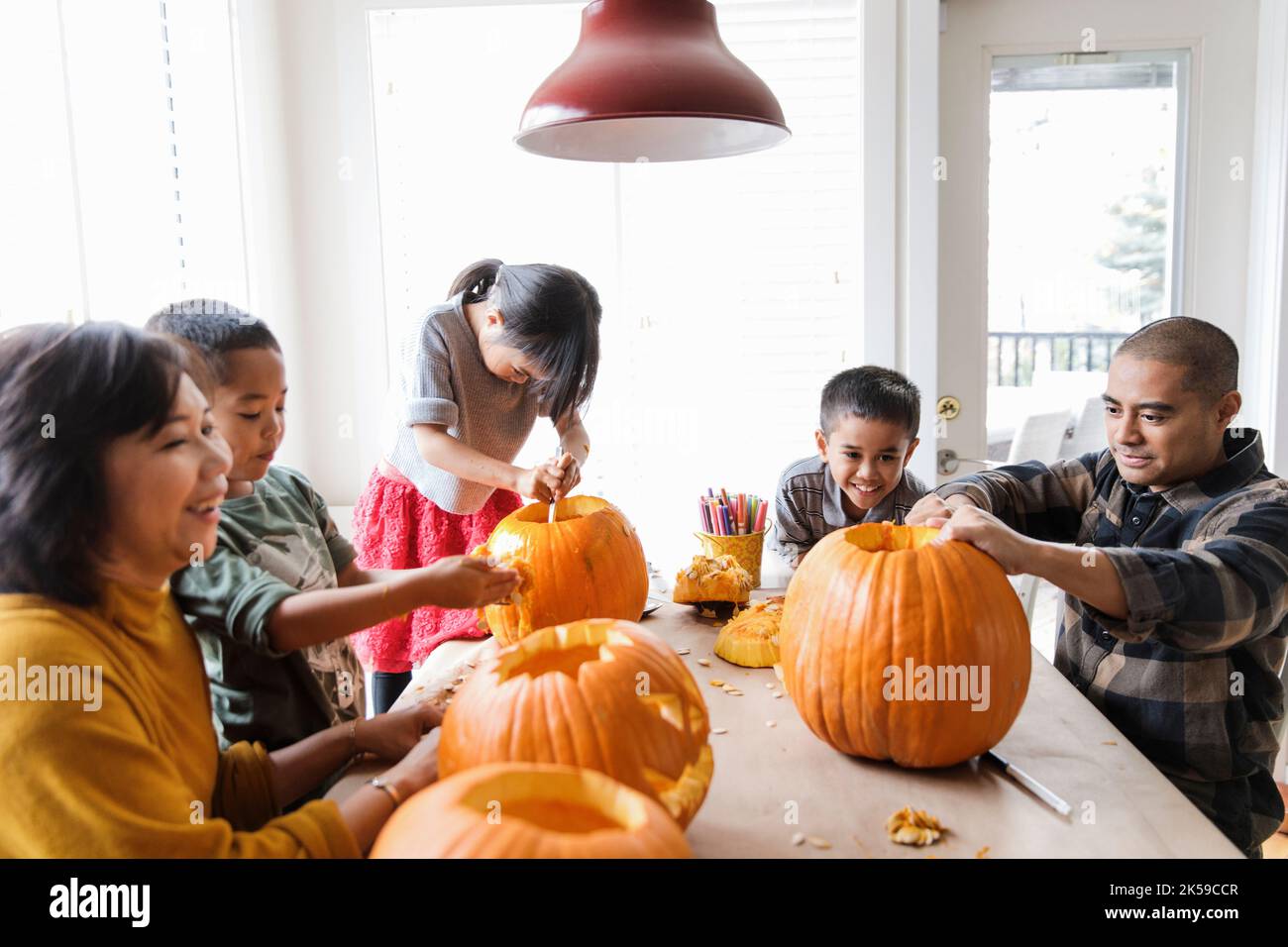 Carving pumpkin family hi-res stock photography and images - Alamy