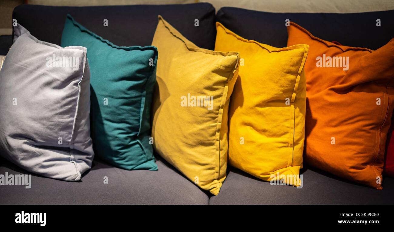Sofa with colorful pillows in room. Home interior with Colorful pillows ...