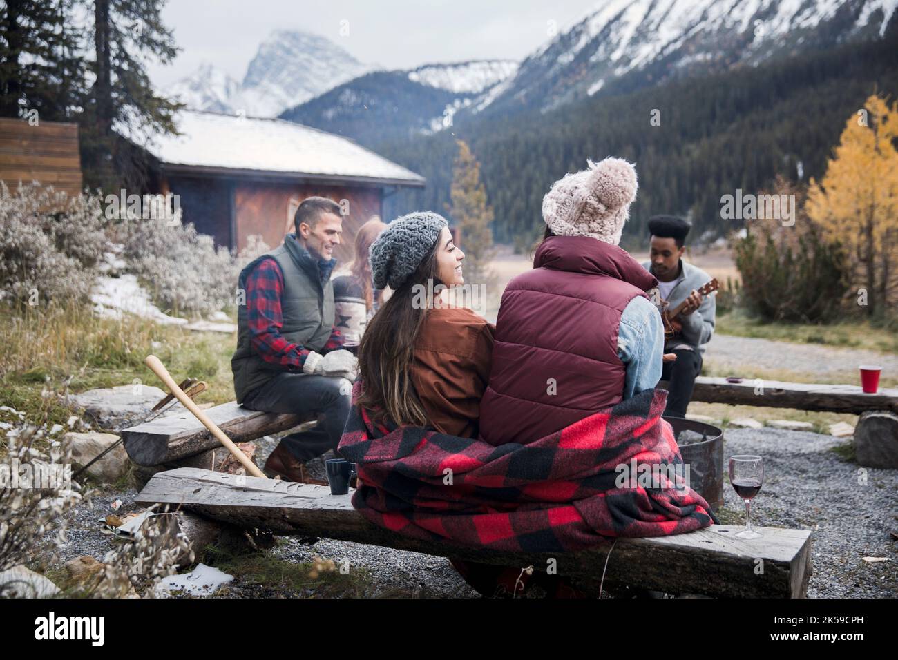 People sitting around a campfire hi-res stock photography and images ...
