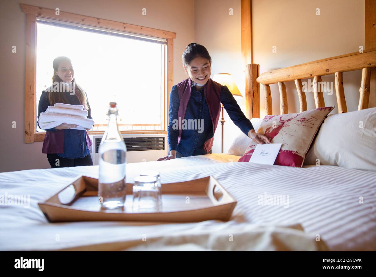 Happy female employee hi-res stock photography and images - Alamy