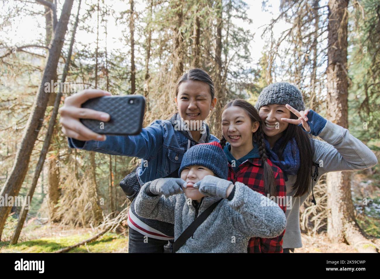 Playful family taking selfie camera phone hi-res stock photography and ...