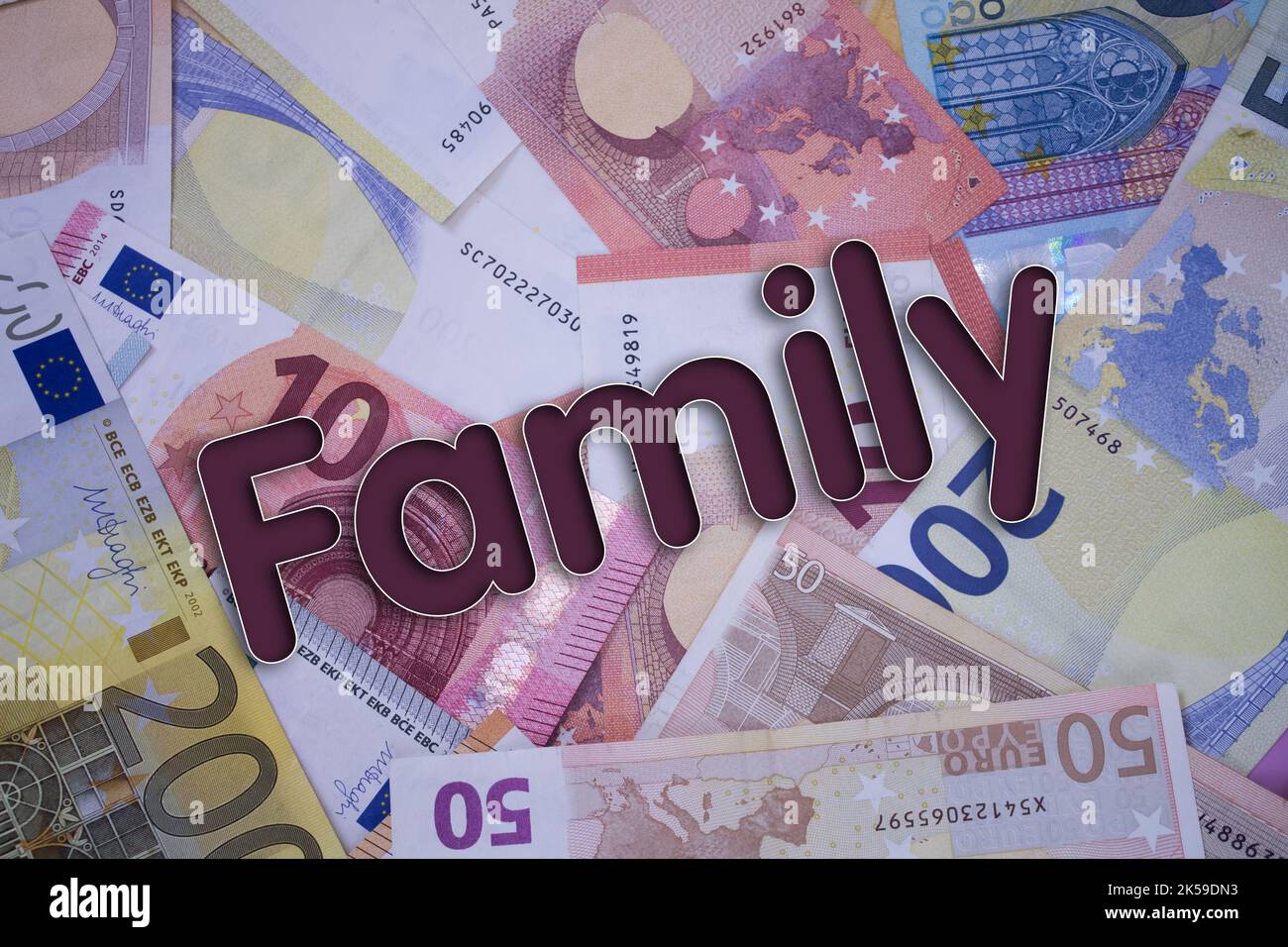 Family word with money. Paper currency background with different ...
