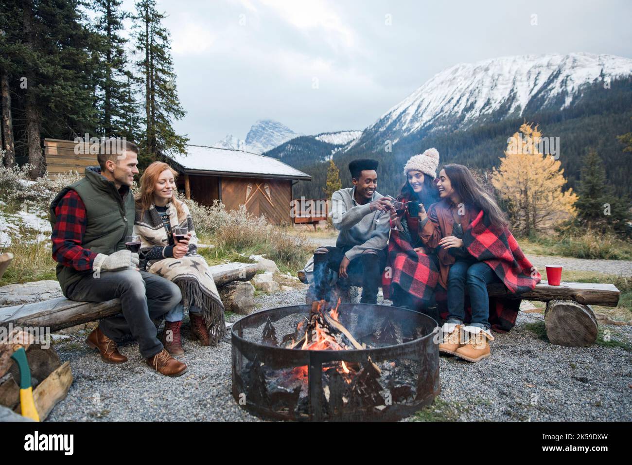 Drinking around a fire hi-res stock photography and images - Alamy