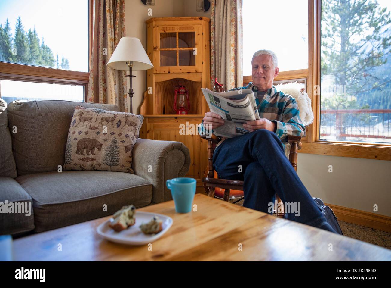 Man in a rocking chair hi-res stock photography and images - Alamy