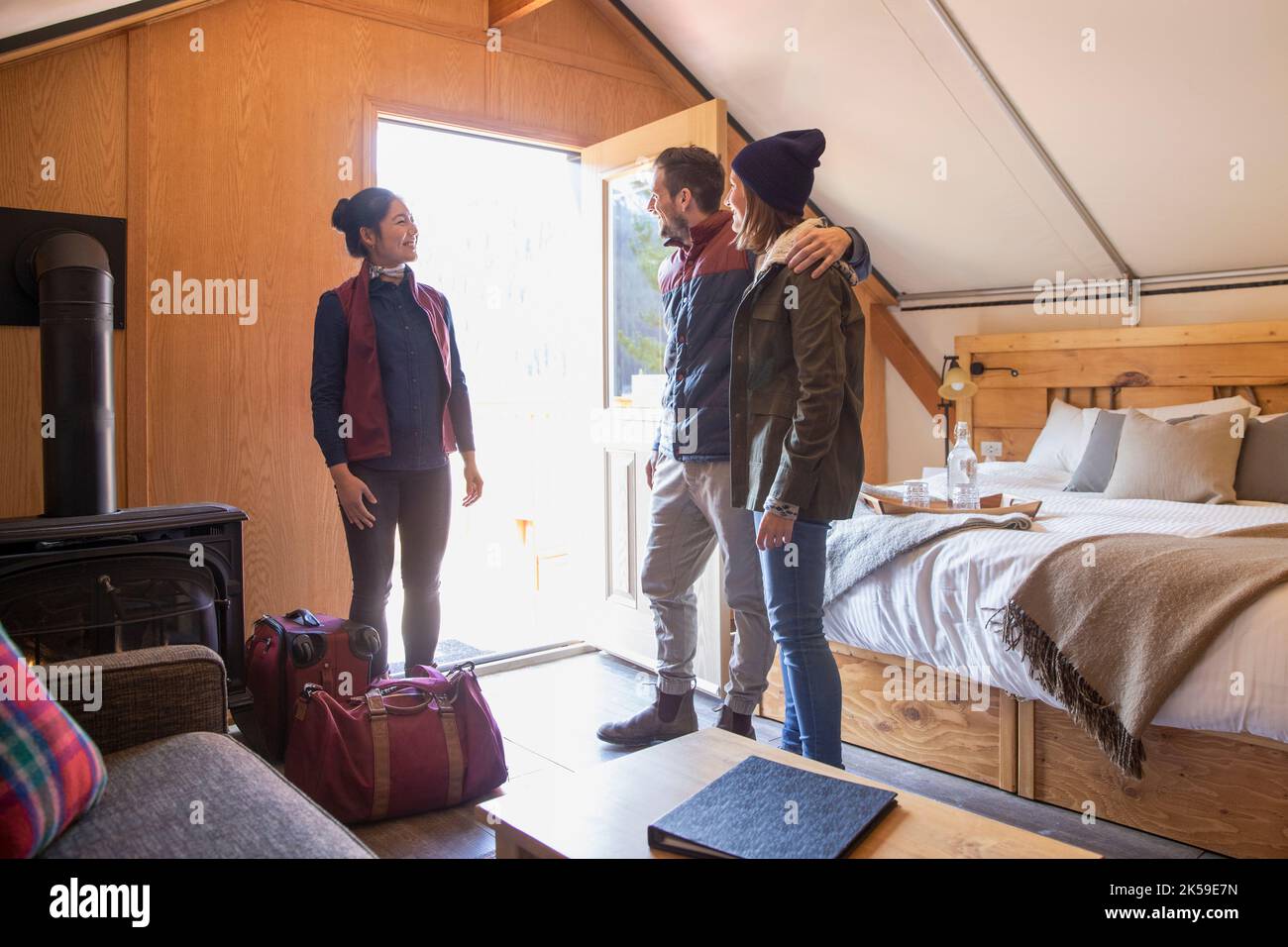 Female hotel employee helping guest hi-res stock photography and images ...