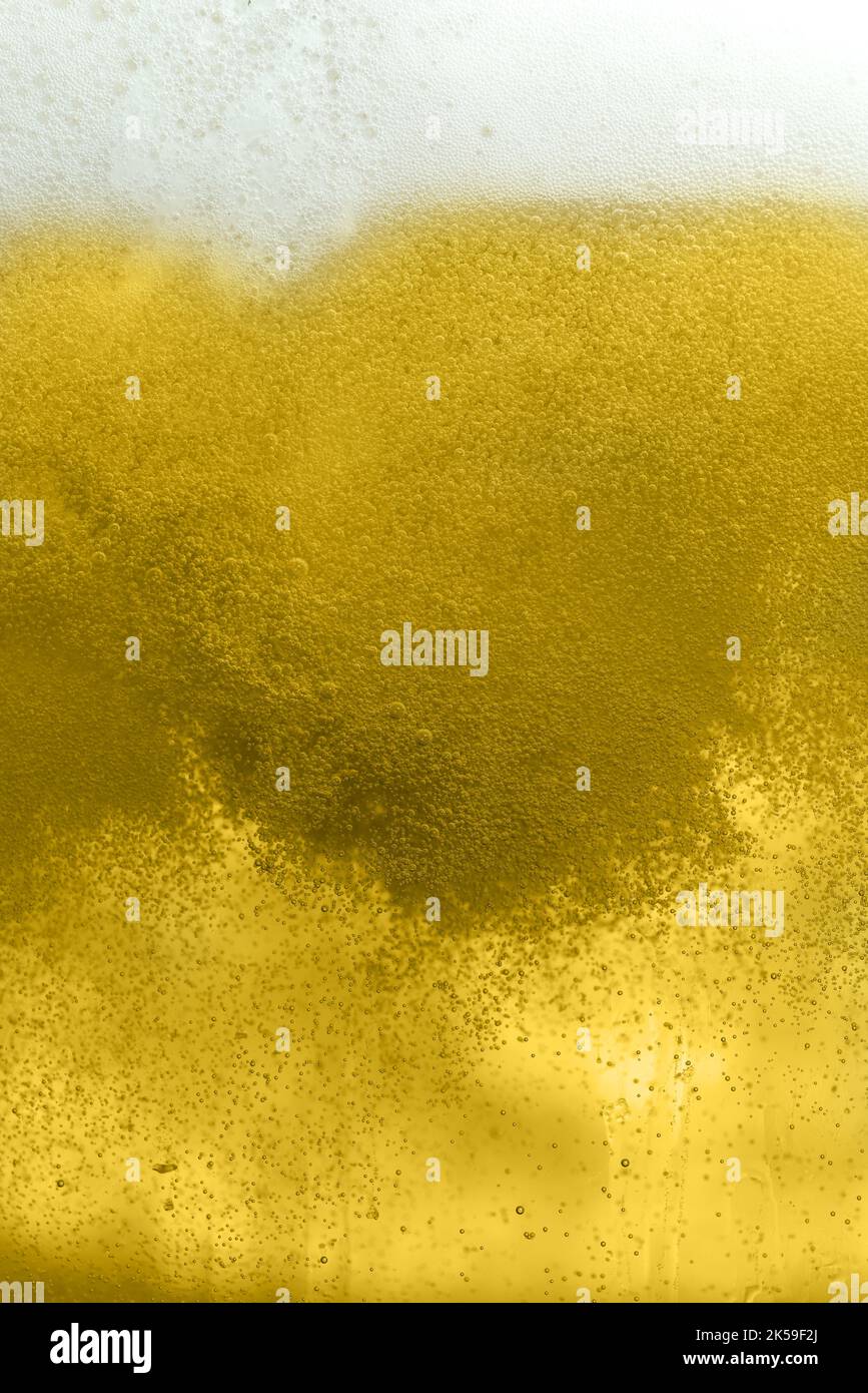 Beer. Light Beer with Bubbles and Foam Background Stock Photo - Alamy