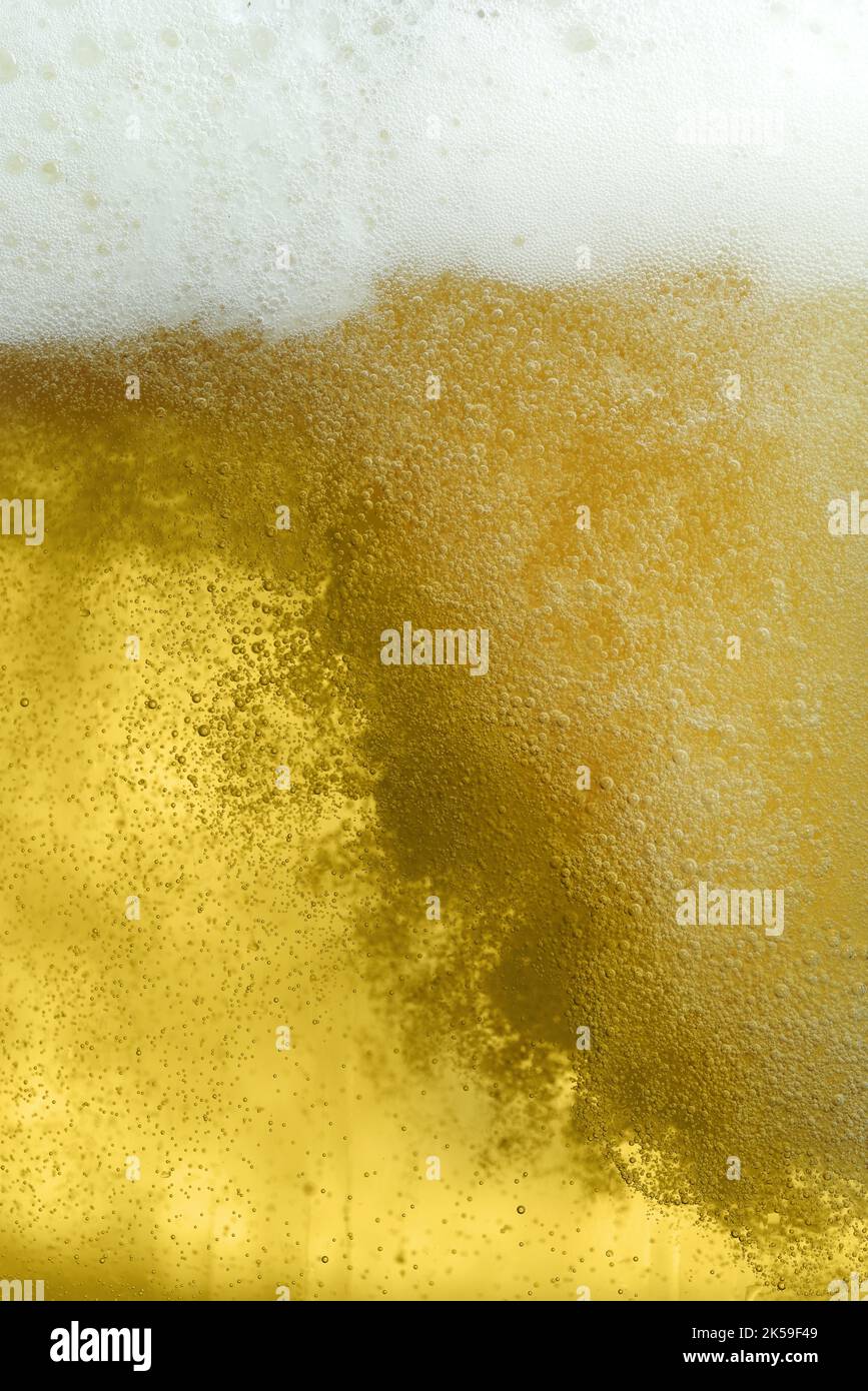 Beer. Light Beer with Bubbles and Foam Background Stock Photo - Alamy