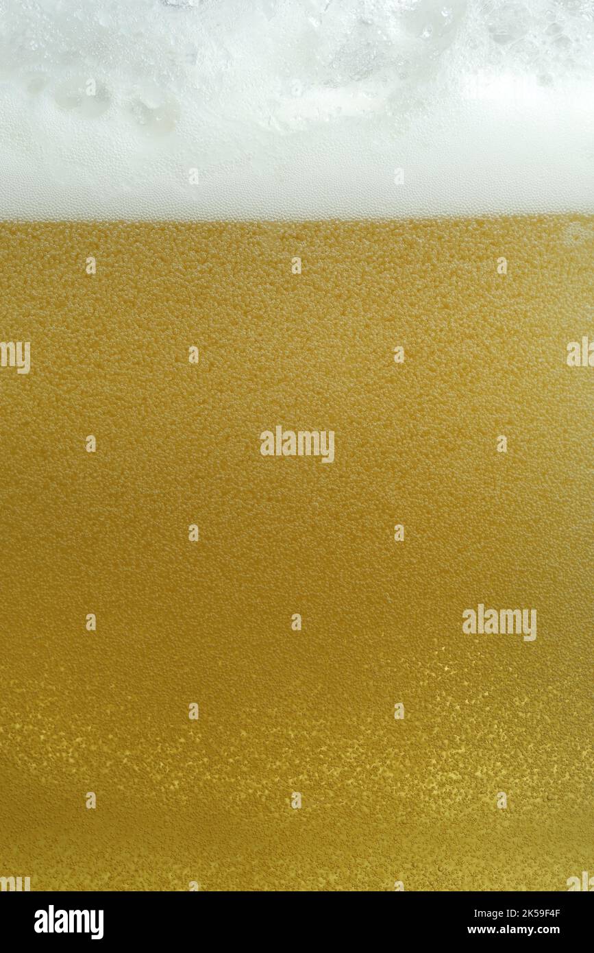 Beer. Light Beer with Bubbles and Foam Background Stock Photo - Alamy