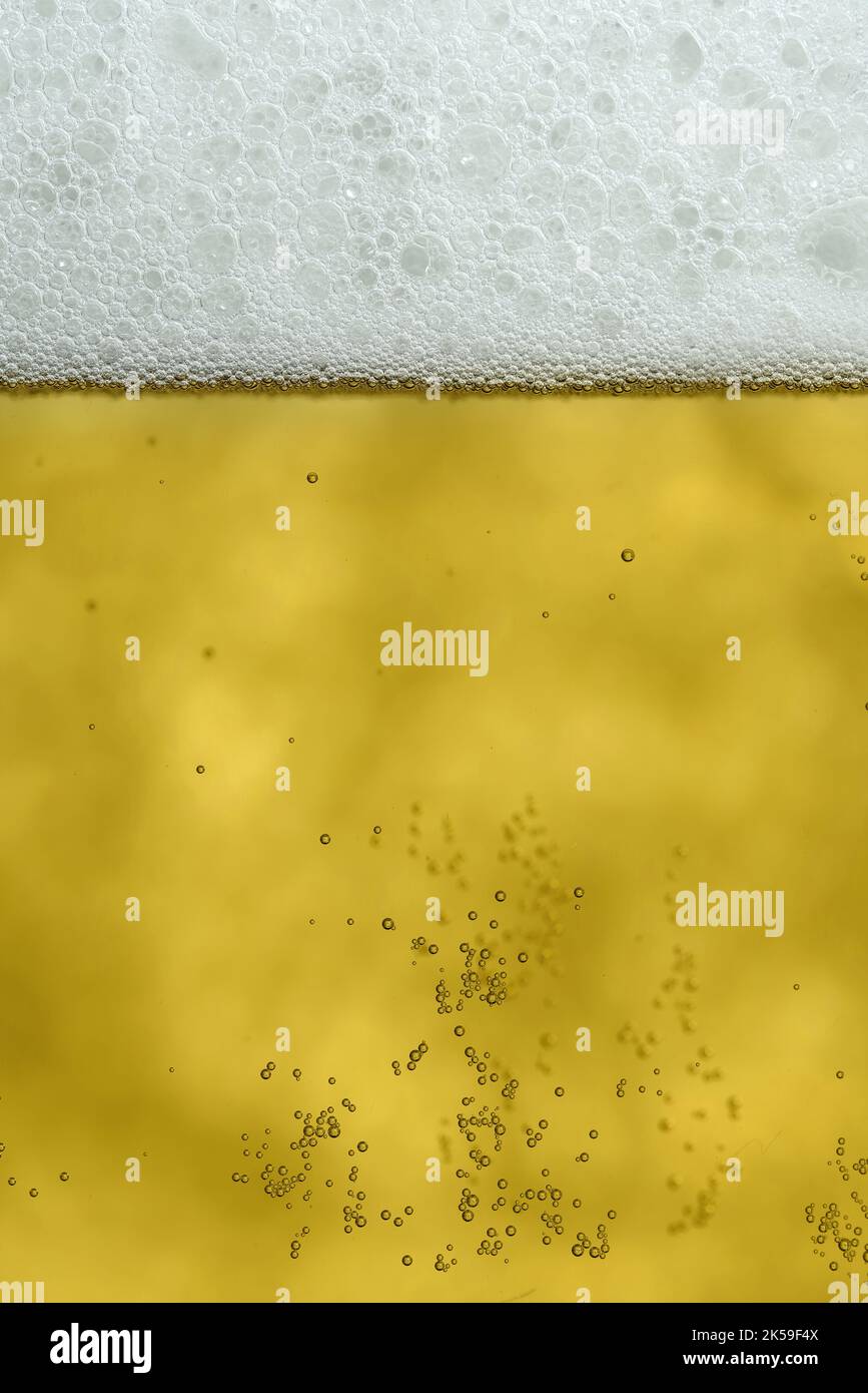 Beer. Light Beer with Bubbles and Foam Background Stock Photo - Alamy