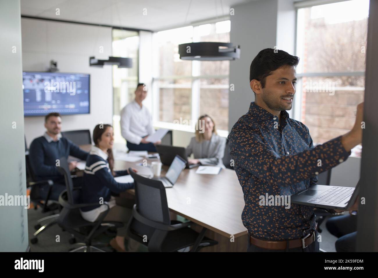 Man giving business presentation in hi-res stock photography and images ...