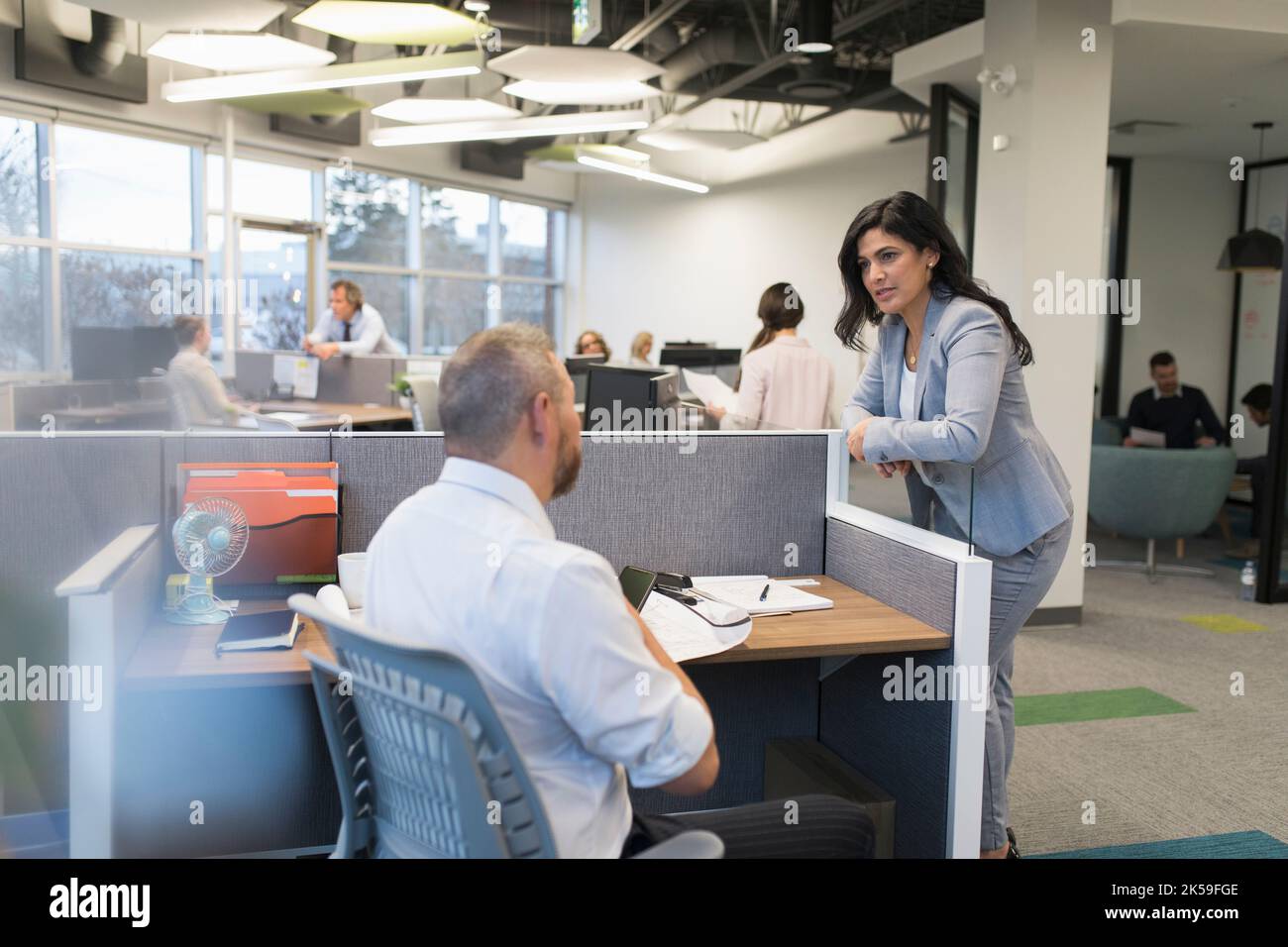 Two colleagues talking office hi-res stock photography and images - Alamy