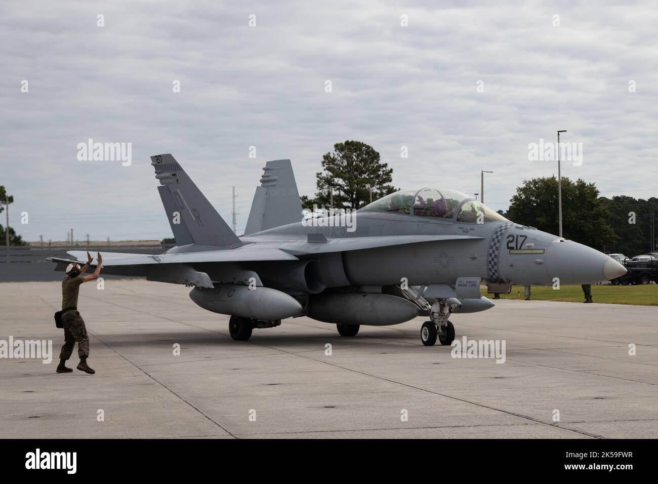 A U.S. Marine with Marine Fighter Attack Squadron (VMFA) 312, Marine ...
