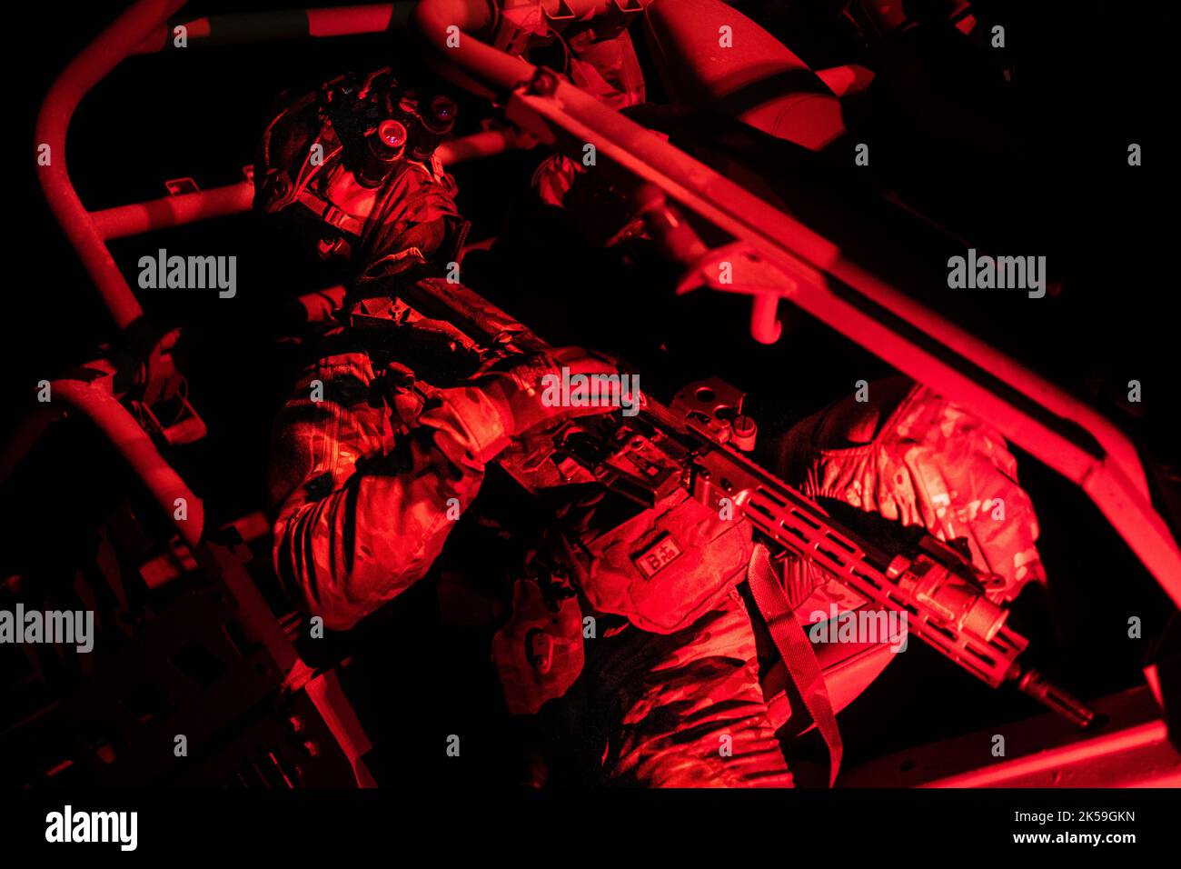 A United Kingdom Royal Marine from 45 Commando sits in a Razor all ...