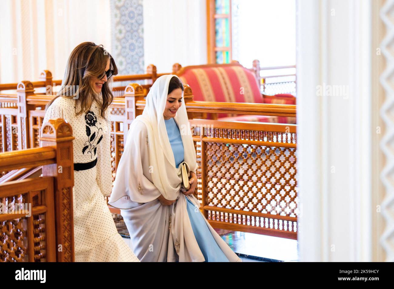 L-R : Jordan’s Queen Rania walk with the Sultan’s wife, the Honourable ...