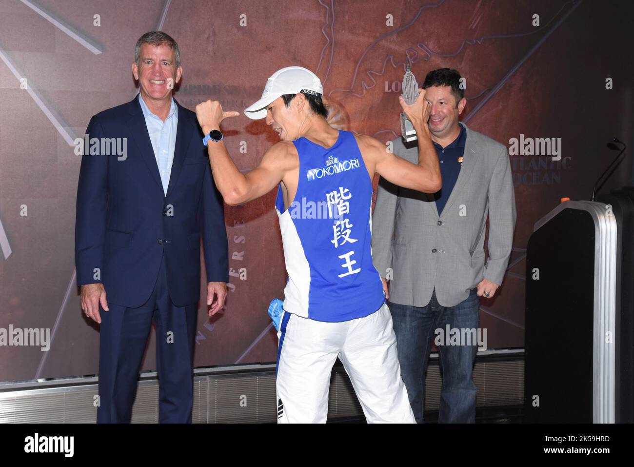 New, York, October 6, 2022. Ryoji Watanabe places second and poses for ...