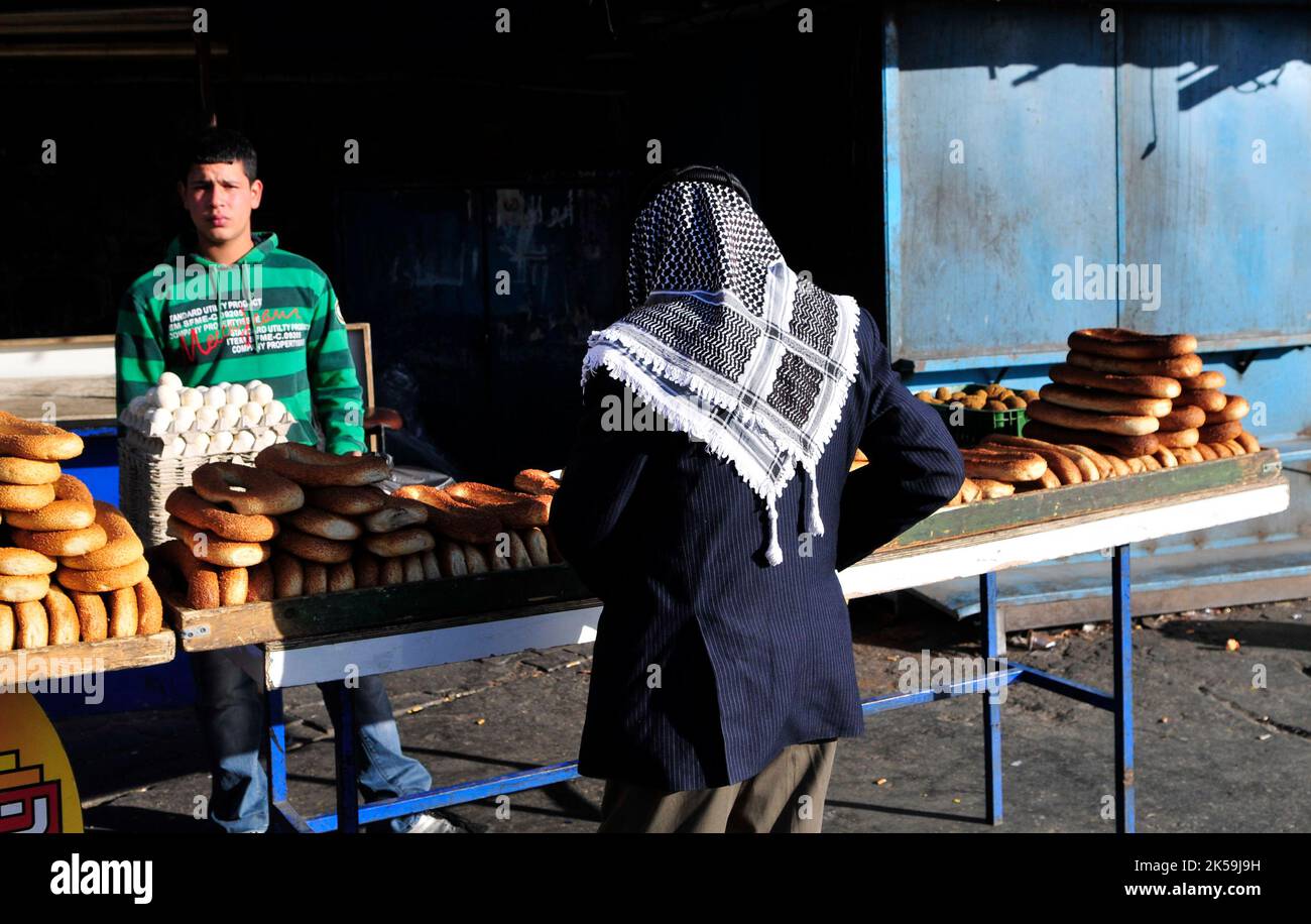 Palestinian bagel bread sold by vendors on Sultan Suleiman street in ...