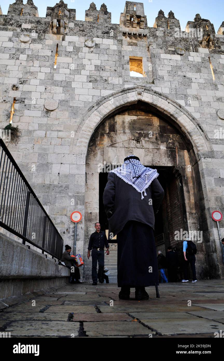 A Palestinian man dressed in traditional clothing outside Damascus gate ...