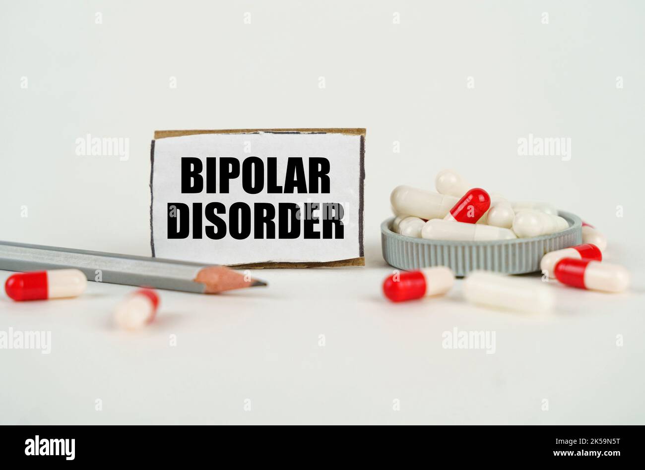 Medical concept. On a white background, medical capsules, a pencil and ...