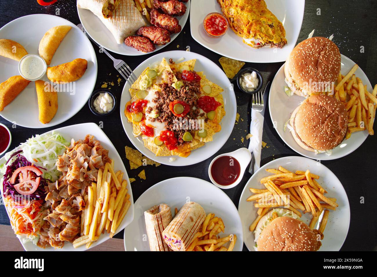 Top angle of various plates of different types of food Stock Photo - Alamy
