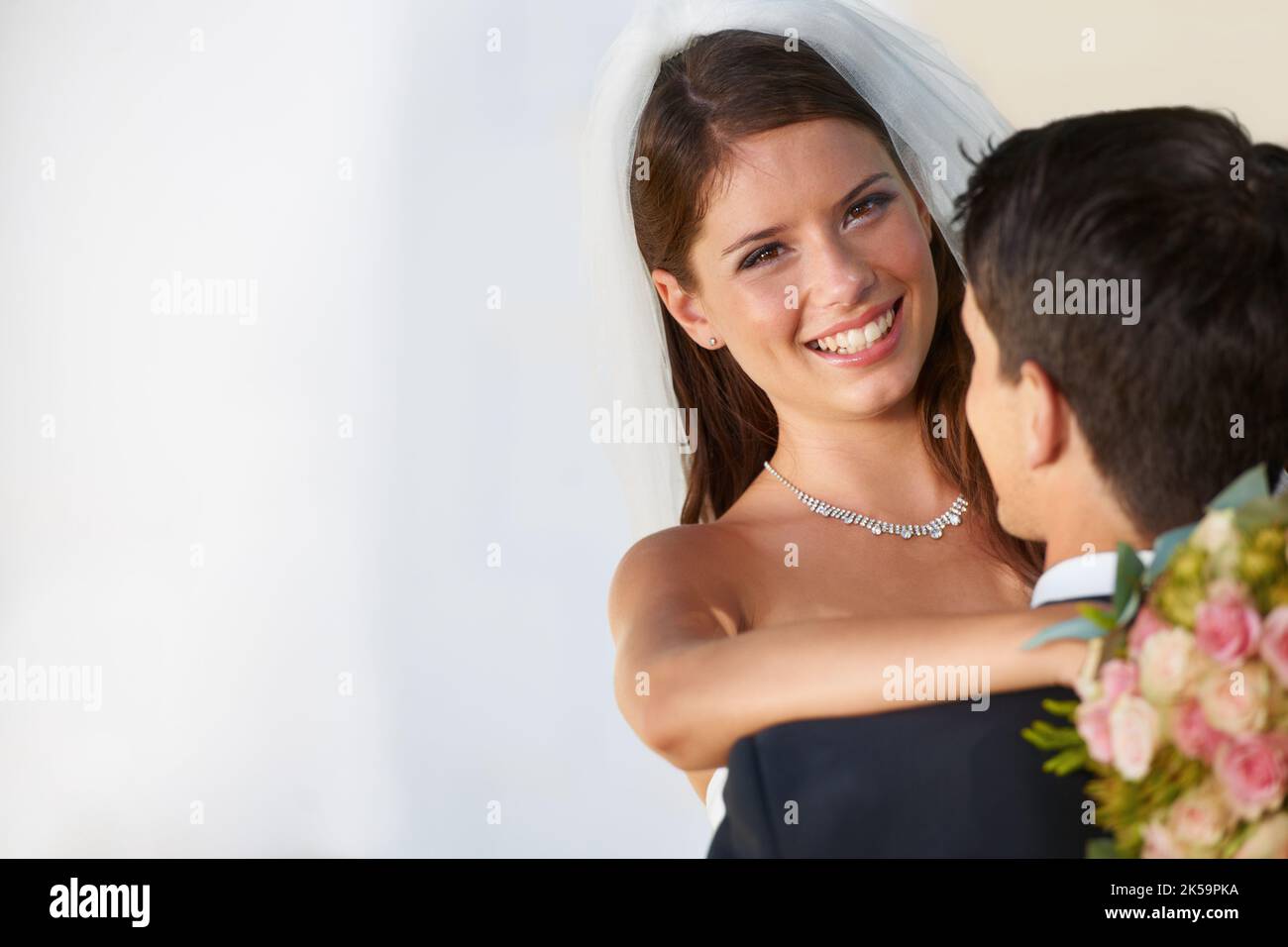 Loving every second with his new wife. Portrait of a delighted young ...