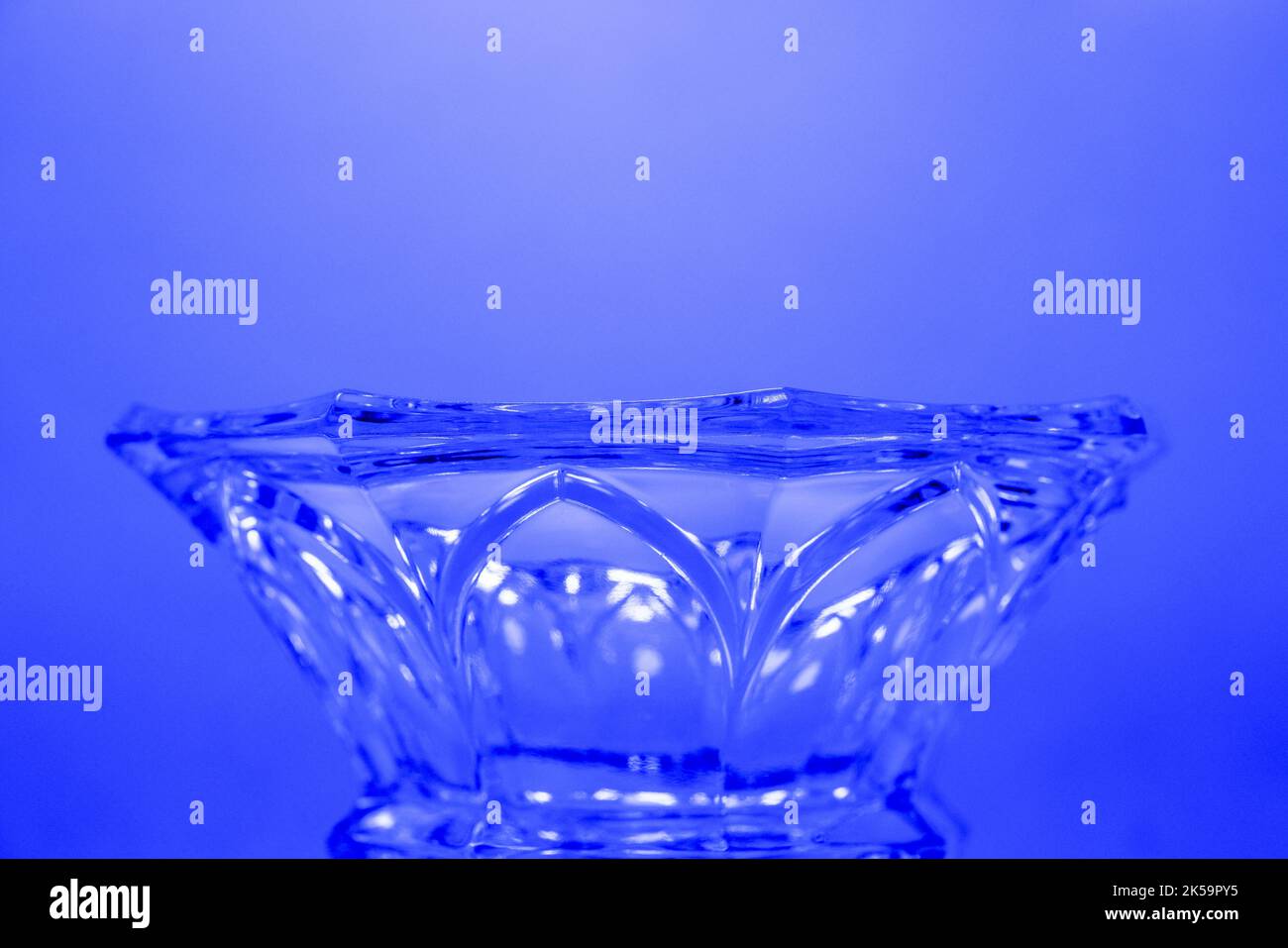 Glass made of crystal-like materials photographed in the studio with ...