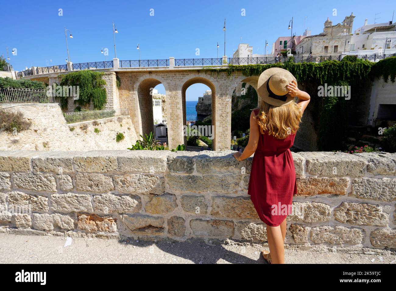 Holidays in Italy. Young tourist woman in Polignano a mare, Apulia ...
