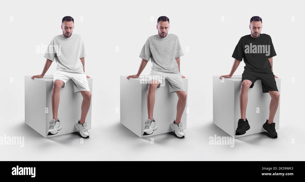 Mockup of white, black and gray men's oversized t-shirt with shorts on ...