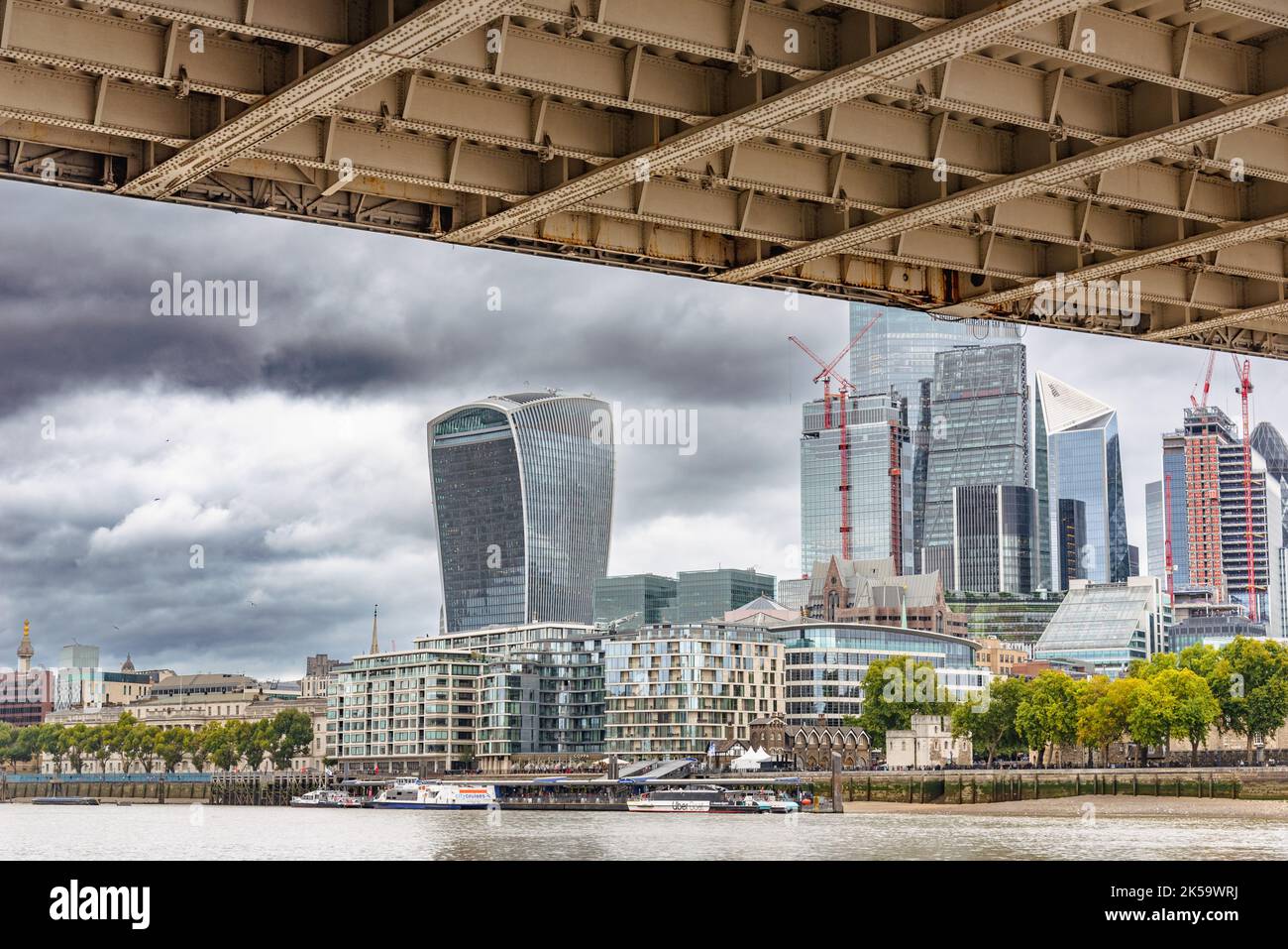 London skyline from under Tower Bridge Stock Photo - Alamy