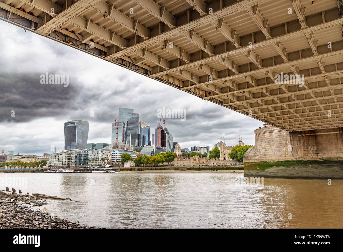 London skyline from under Tower Bridge Stock Photo - Alamy