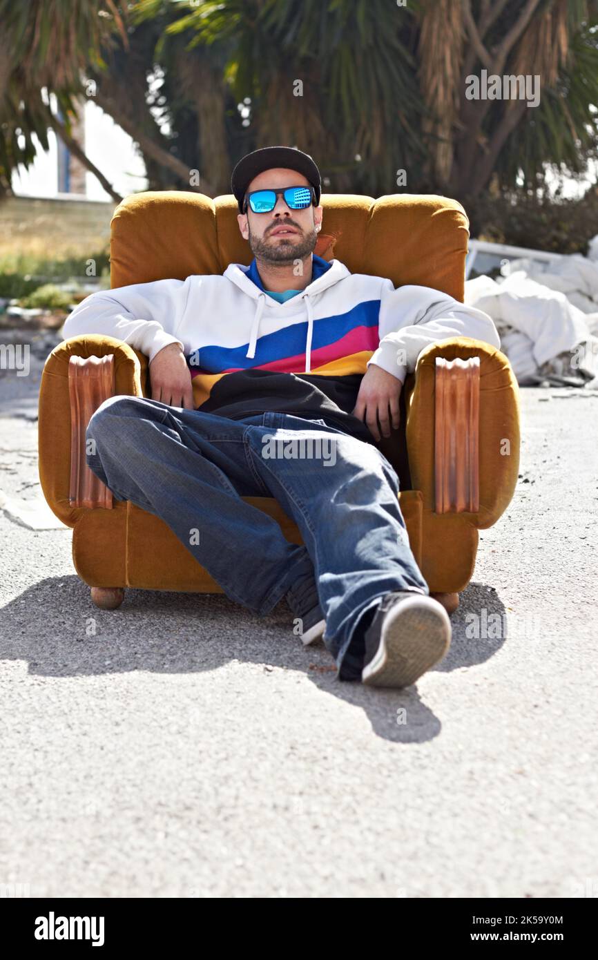 Sitting seated street urban hi-res stock photography and images - Alamy