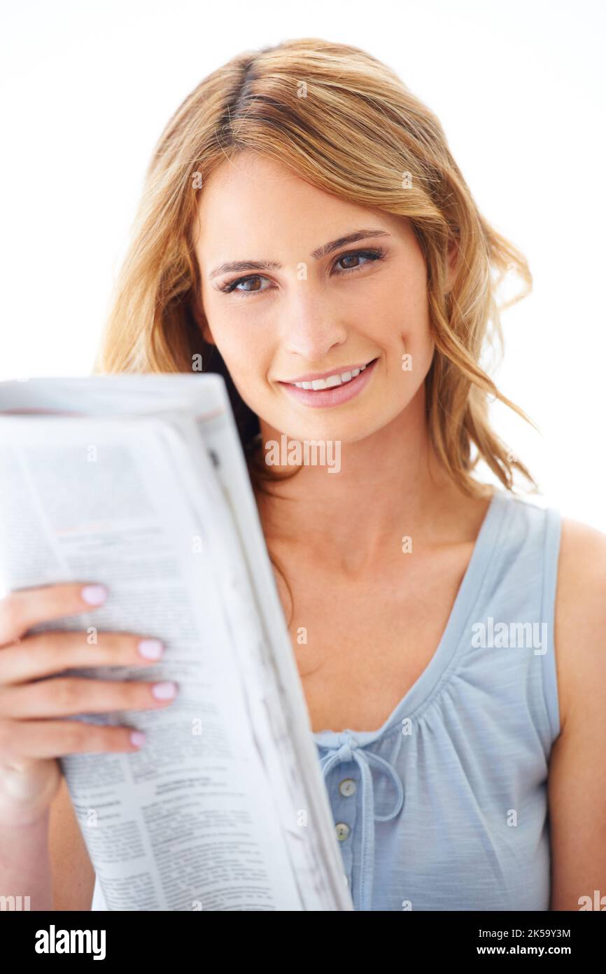 Young blond woman reading newspaper hi-res stock photography and images ...