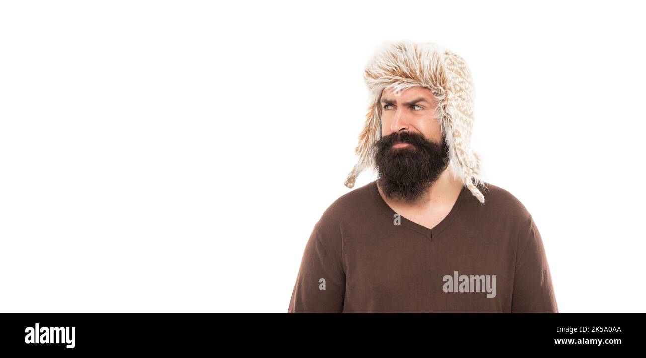 confused bearded man with moustache in earflape hat isolated on white ...