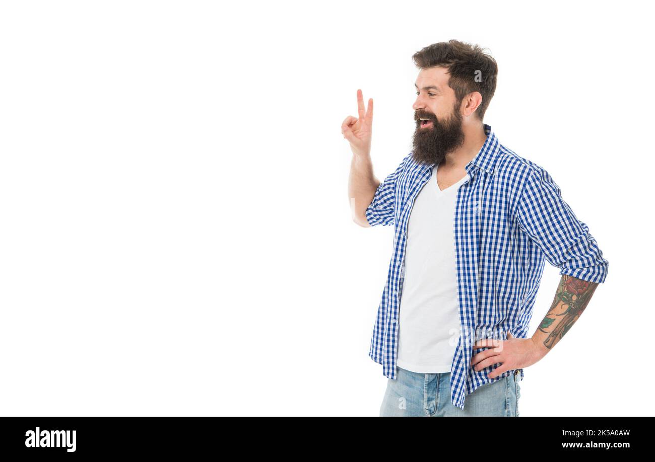 Happy smiling bearded man showing victory peace V sign gesture in ...