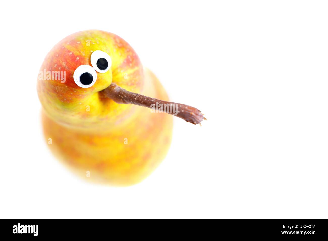 Top view of a cute pear fruit character with googly eyes isolated on ...