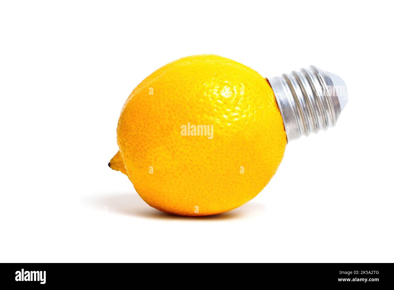 Light bulb made from a fresh lemon isolated on white background ...