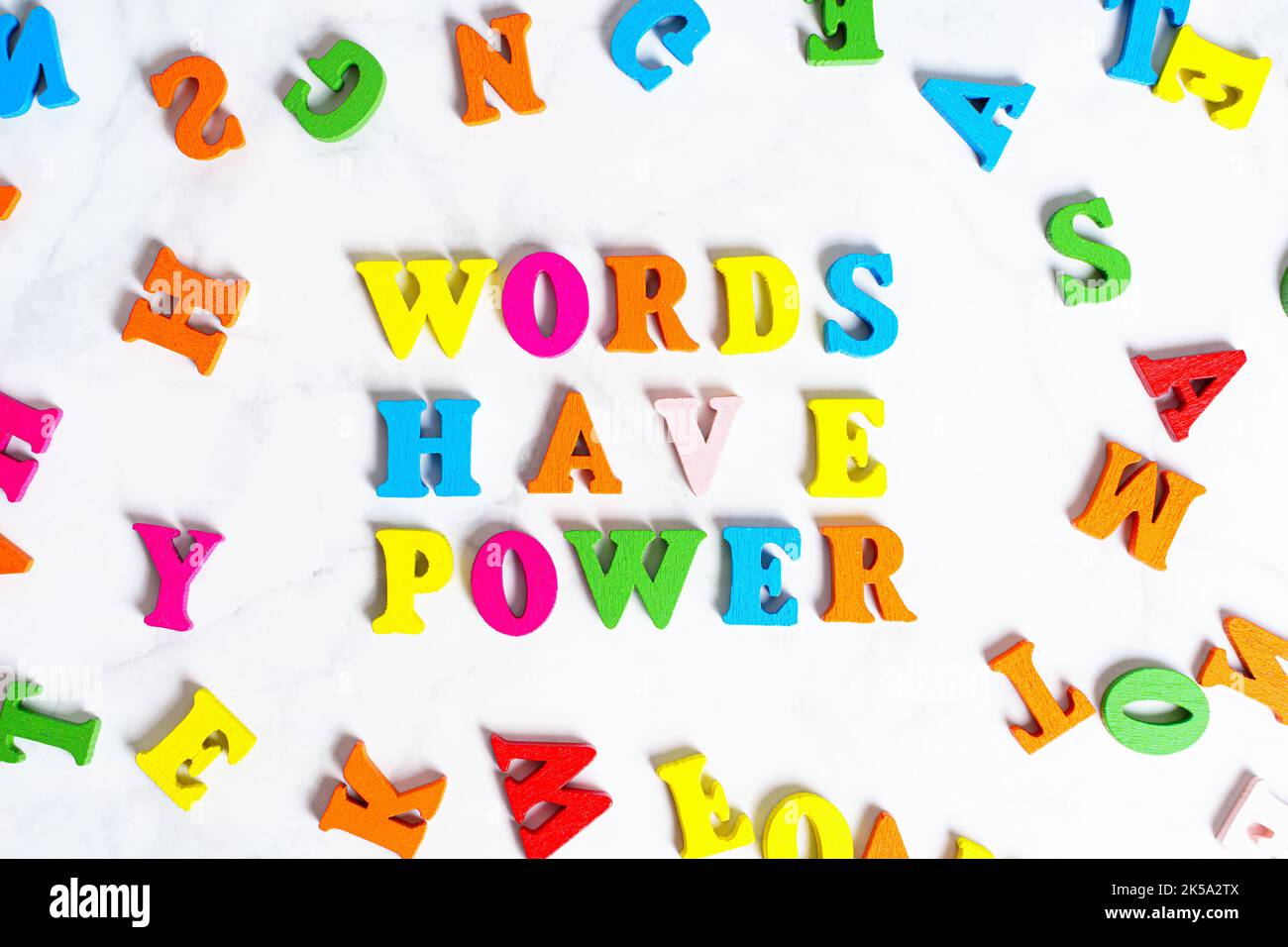 WORDS HAVE POWER quote made from multicolored wooden letter characters ...