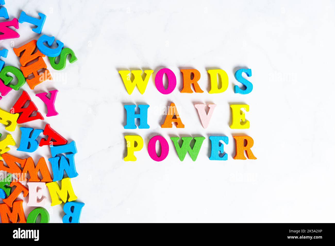Words have power arrangement made from multicolored wooden characters ...
