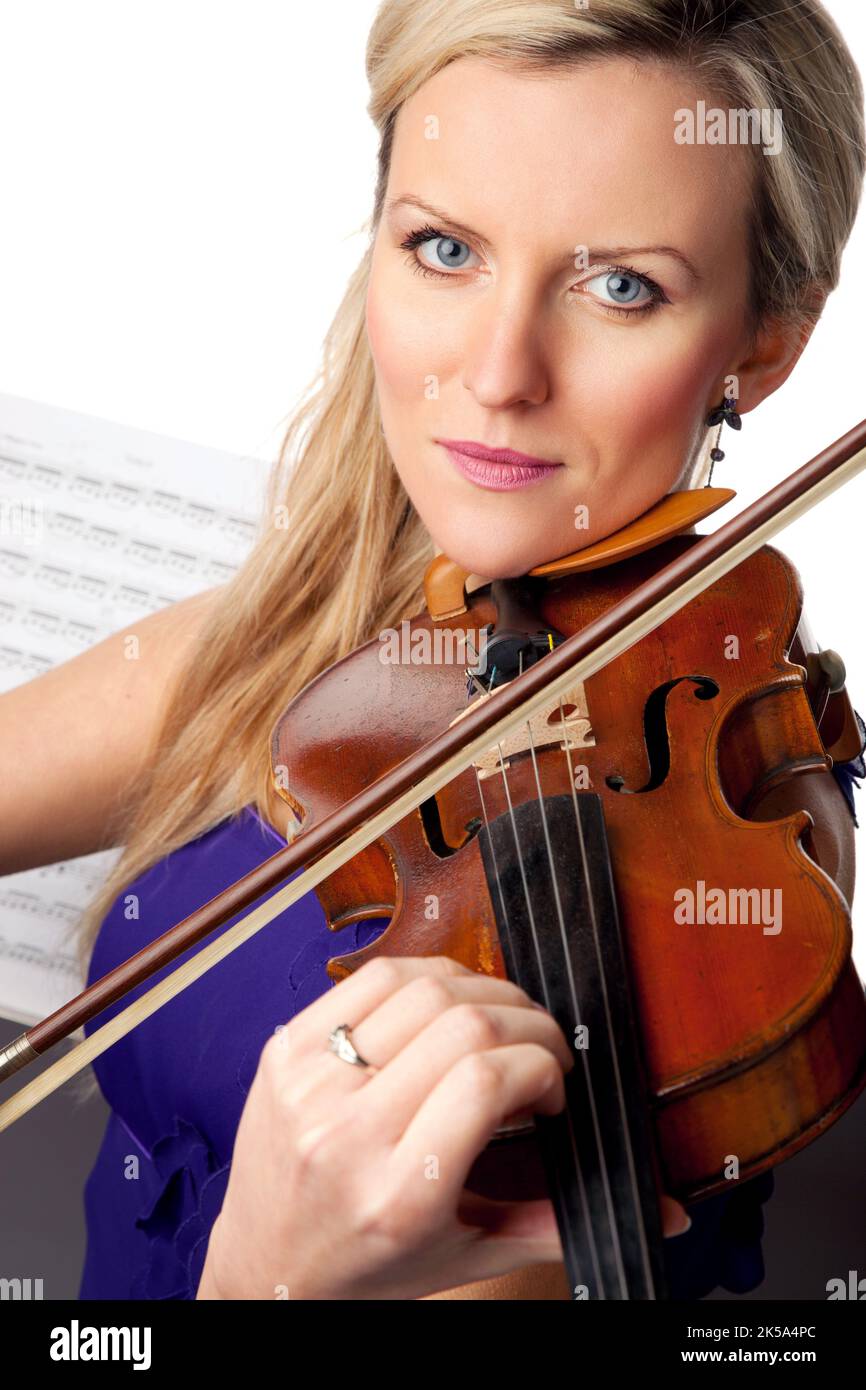 Beautiful woman playing violin hi-res stock photography and images - Alamy