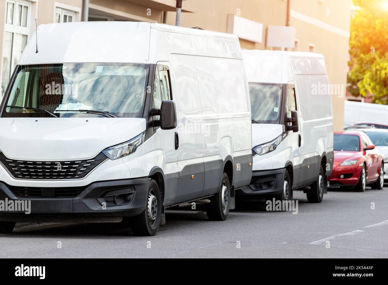 Small cargo delivery van parked in european city central district ...