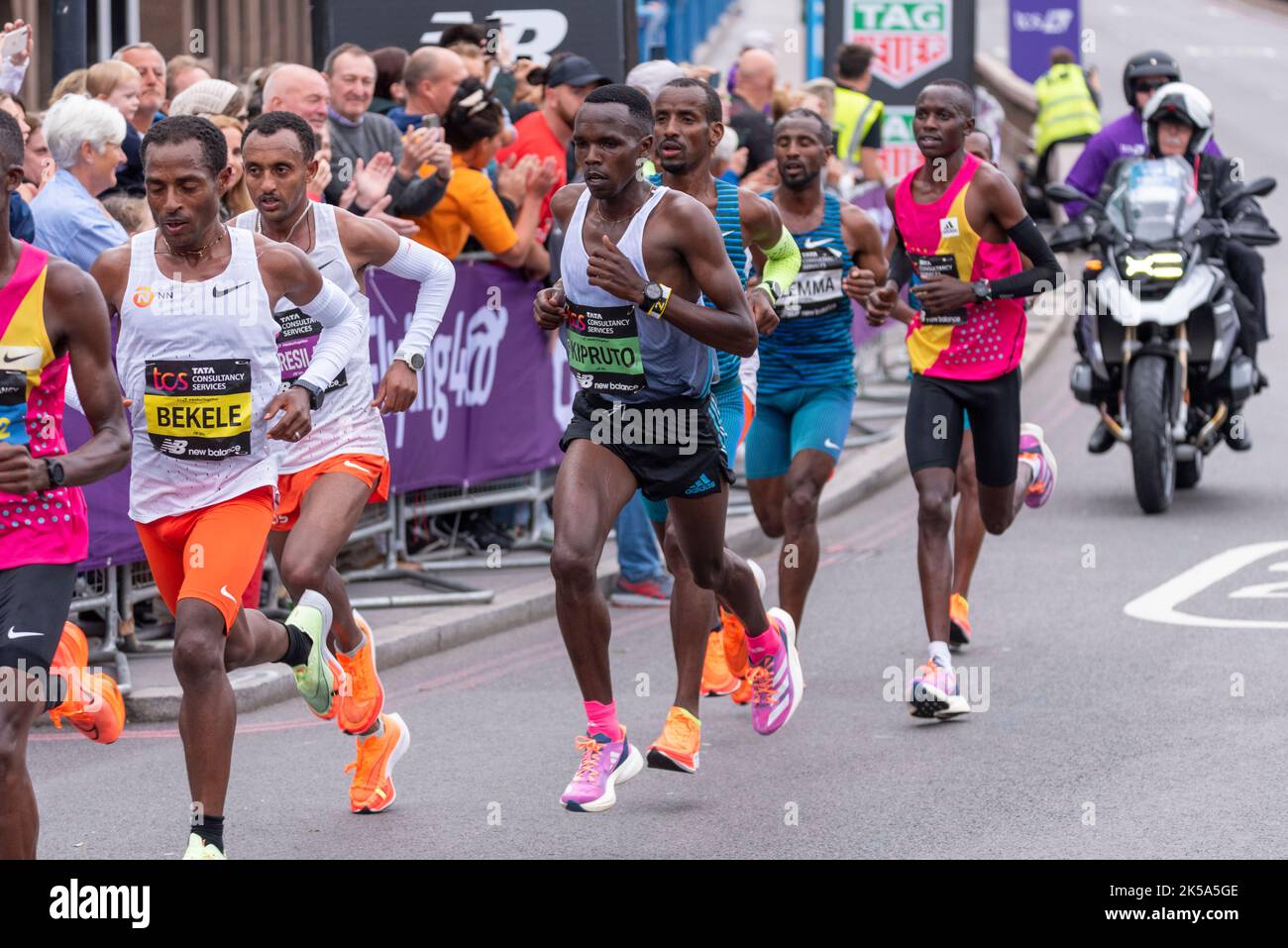 Elite men racing in the TCS London Marathon 2022 Elite Men's race in Tower Hill, City of London ...