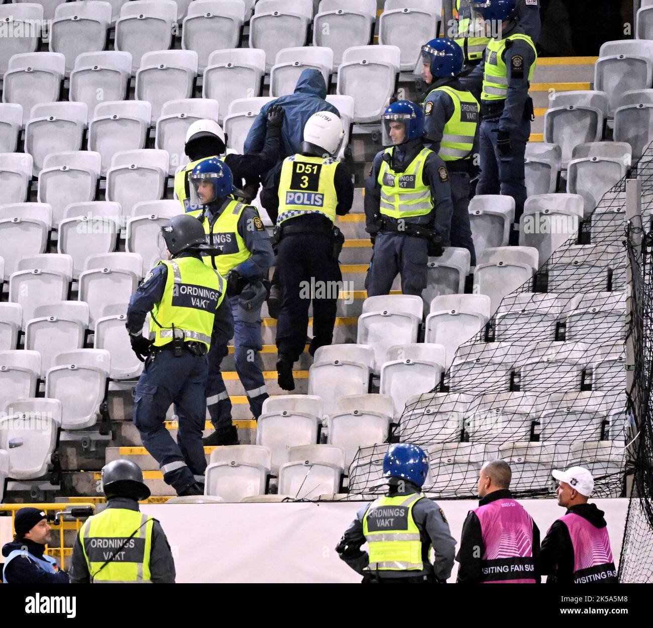 Malmö, Sweden, 6 October 2022. Riot police arrest and take away a ...