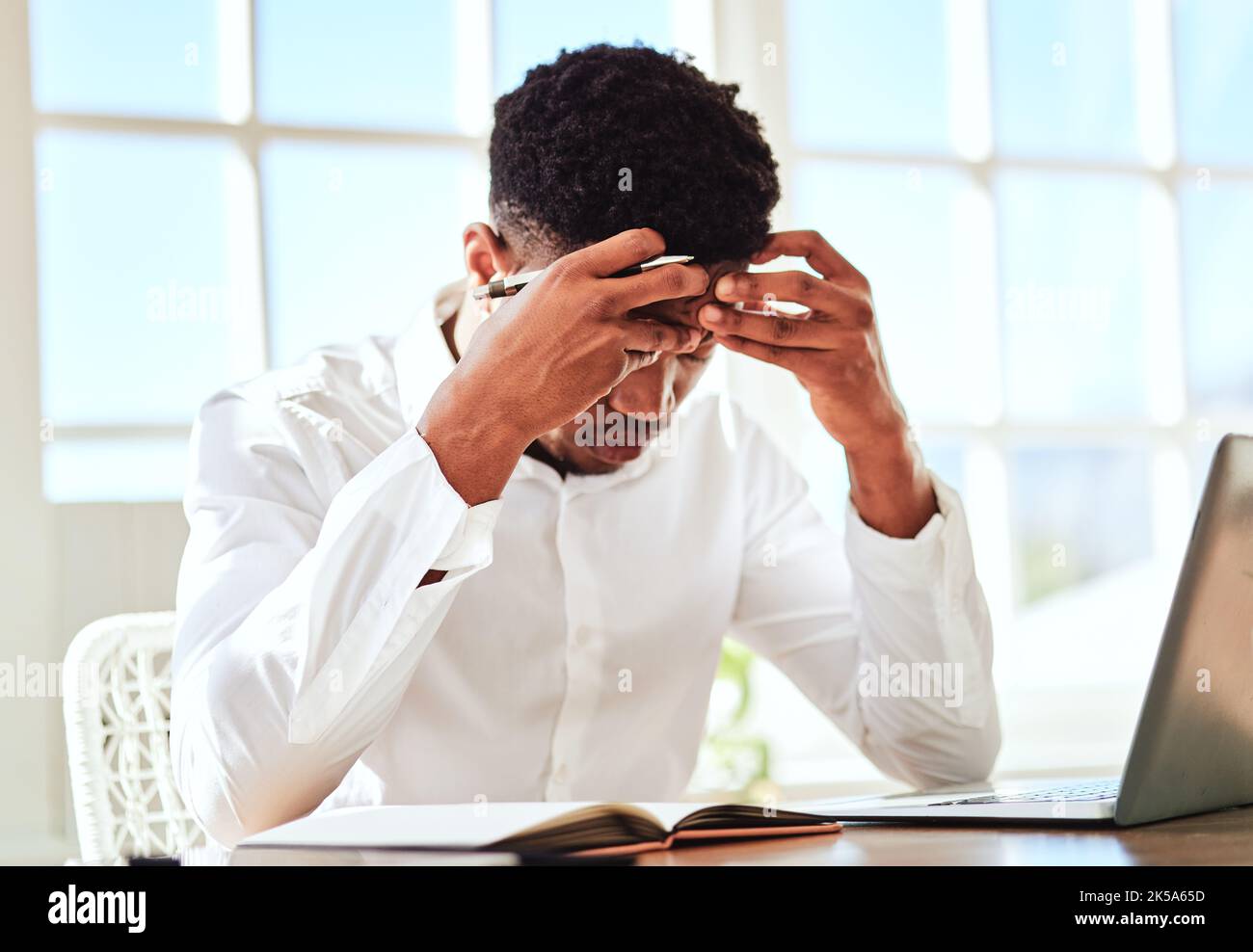 African sad office hi-res stock photography and images - Alamy