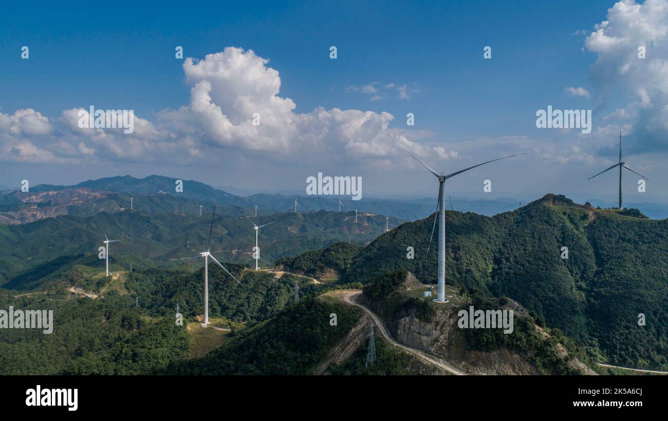 NANNING, CHINA - OCTOBER 6, 2022 - 25 wind turbines form a windmill ...