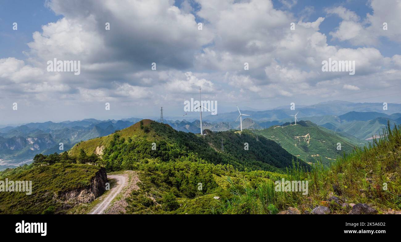 NANNING, CHINA - OCTOBER 6, 2022 - 25 wind turbines form a windmill ...