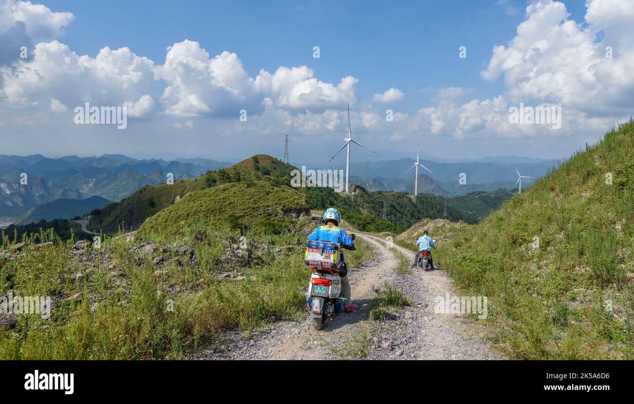 NANNING, CHINA - OCTOBER 6, 2022 - 25 wind turbines form a windmill ...