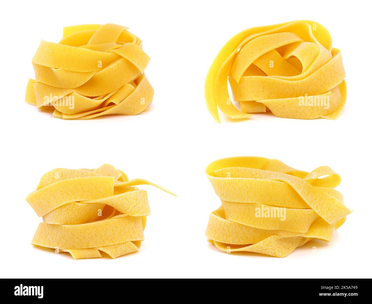 Egg pasta nest isolated on white Stock Photo - Alamy