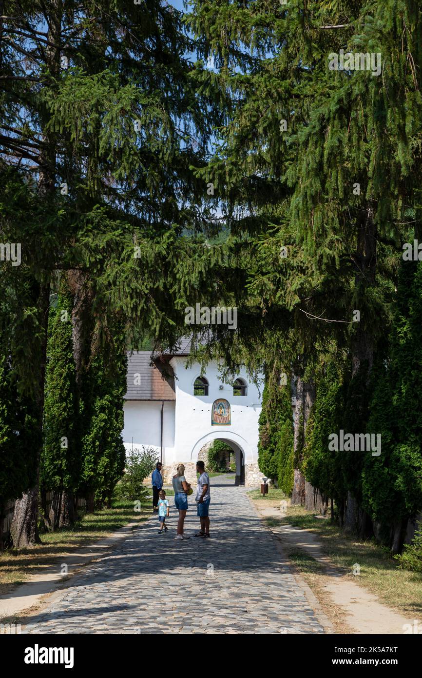 The entrance alley to the Polovragi Monastery, Gorj, Romania. The ...